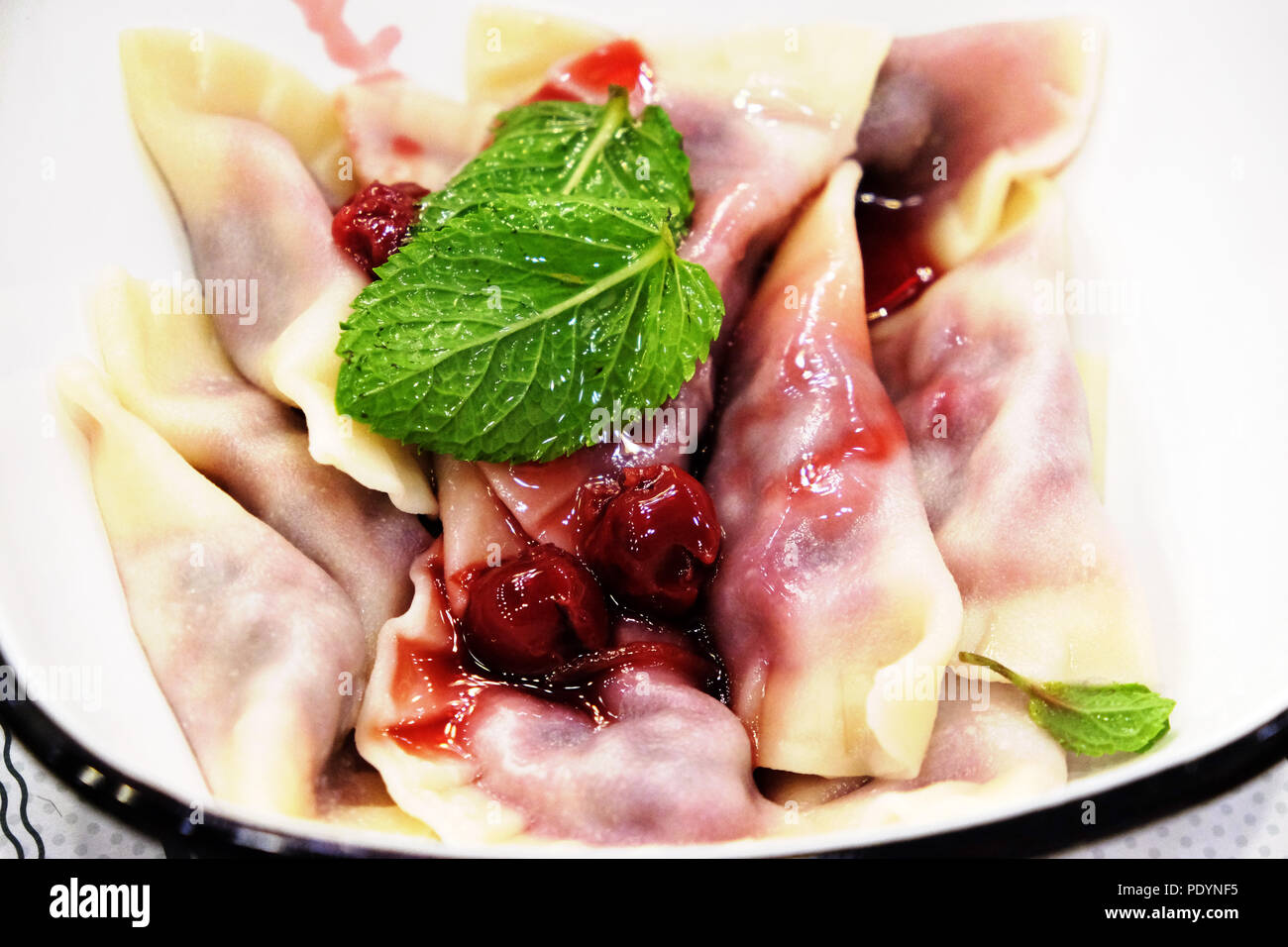Russian food - cherries vareniki- Delicious dumplings with fresh ...