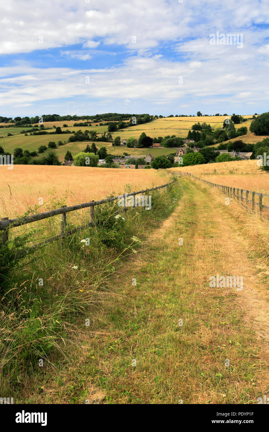 The Stone built Cottages of Naunton village, nestling in the river ...