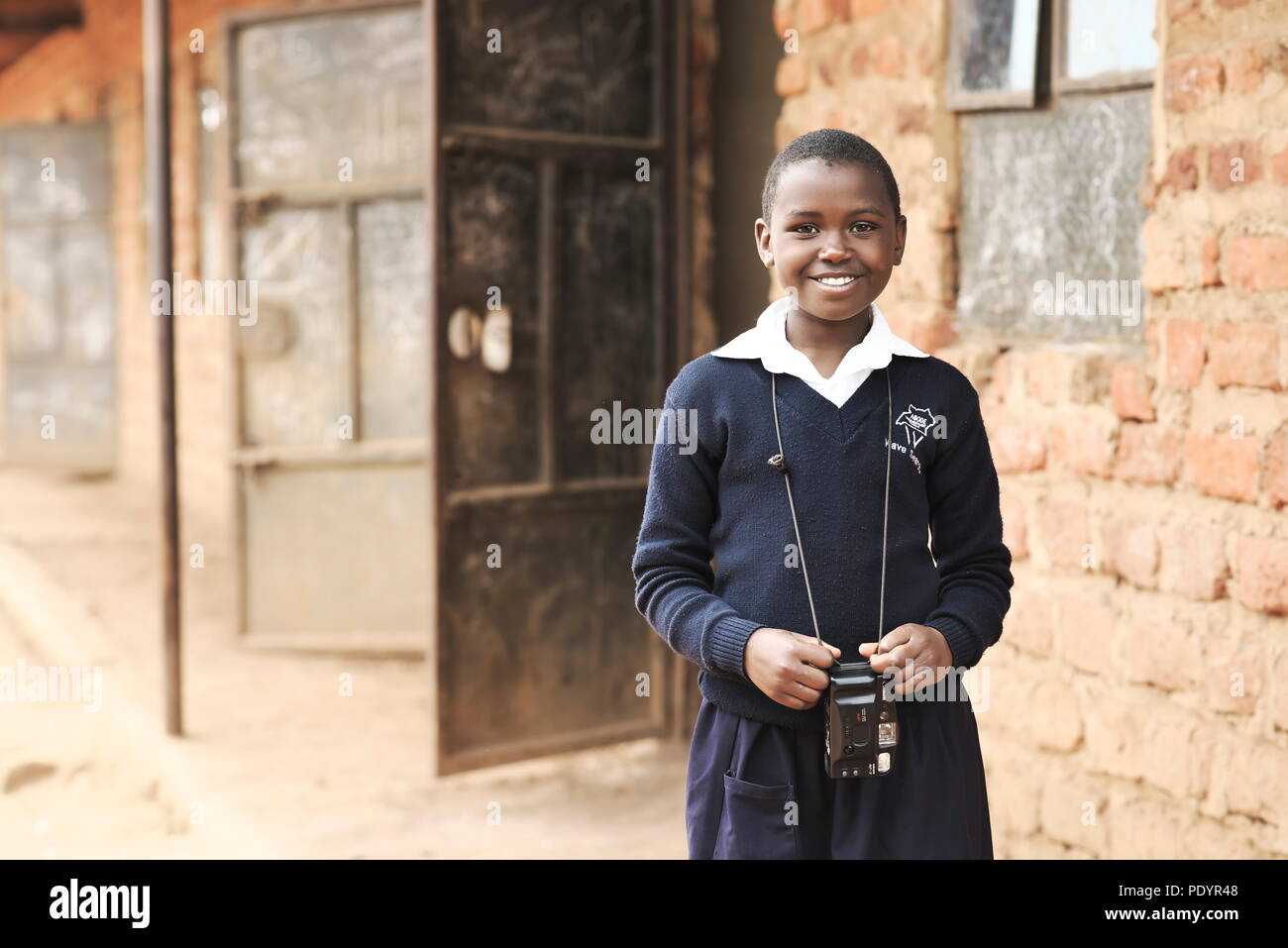 Ugandan school uniform hi-res stock photography and images - Alamy
