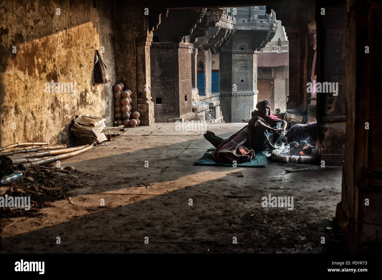 "Eternal fire" by the Cremations gath on the Ganges river bank ...