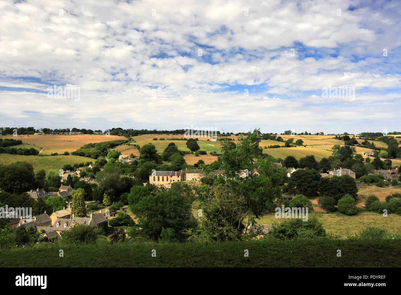 The Stone built Cottages of Naunton village, nestling in the river ...