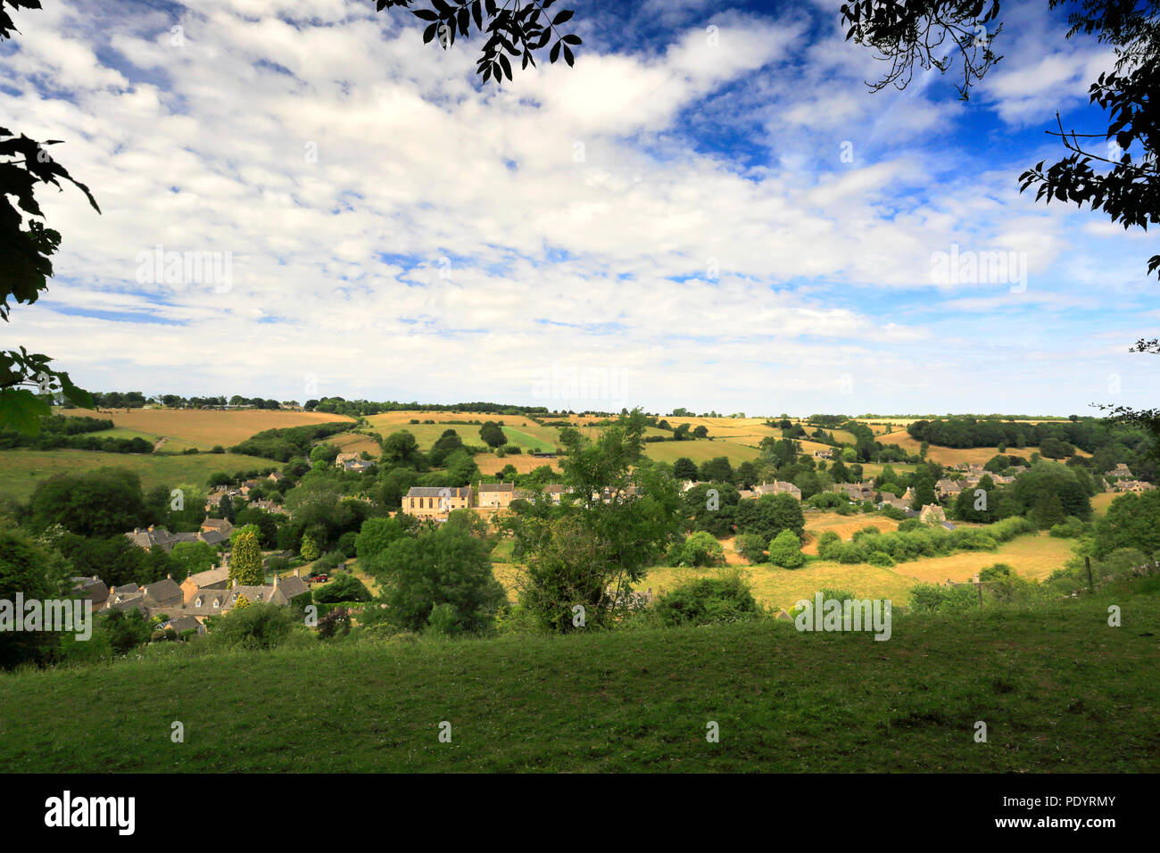 The Stone built Cottages of Naunton village, nestling in the river ...