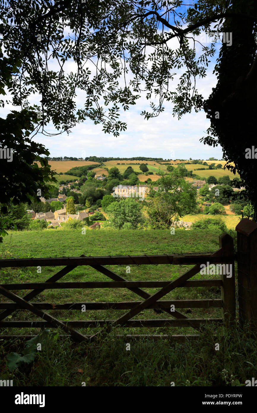 The Stone built Cottages of Naunton village, nestling in the river ...