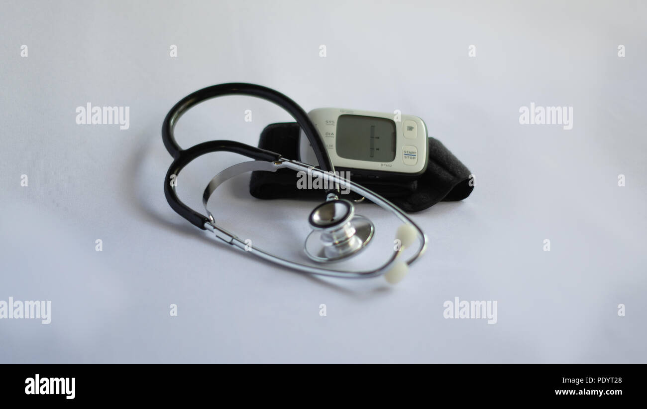 Stethoscope and Blood Pressure Monitor on White Background Stock Photo ...