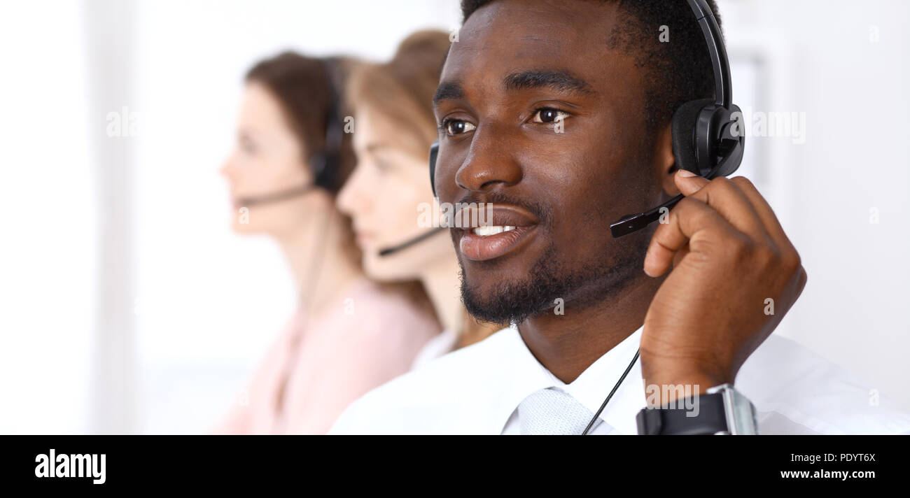 African american call operator in headset. Call center business or ...