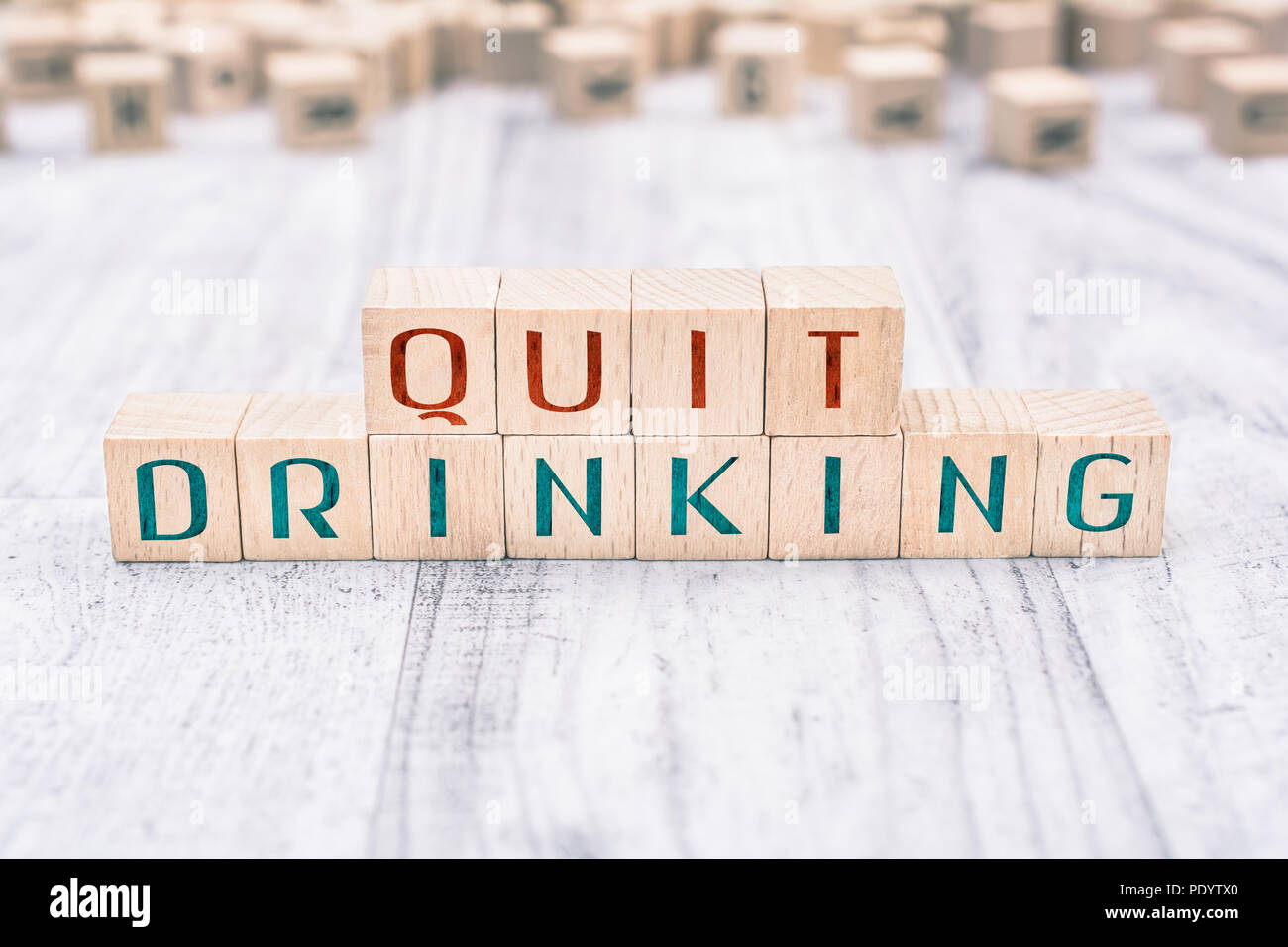 The Words Quit Drinking Formed By Wooden Blocks On A White Table ...