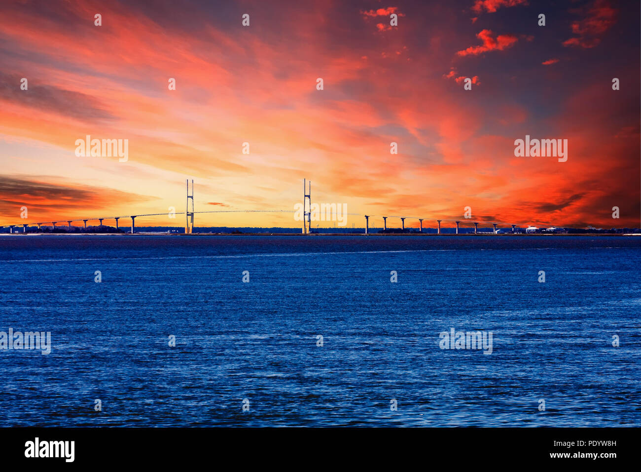 A suspension bridge over a channel in the bay Stock Photo - Alamy