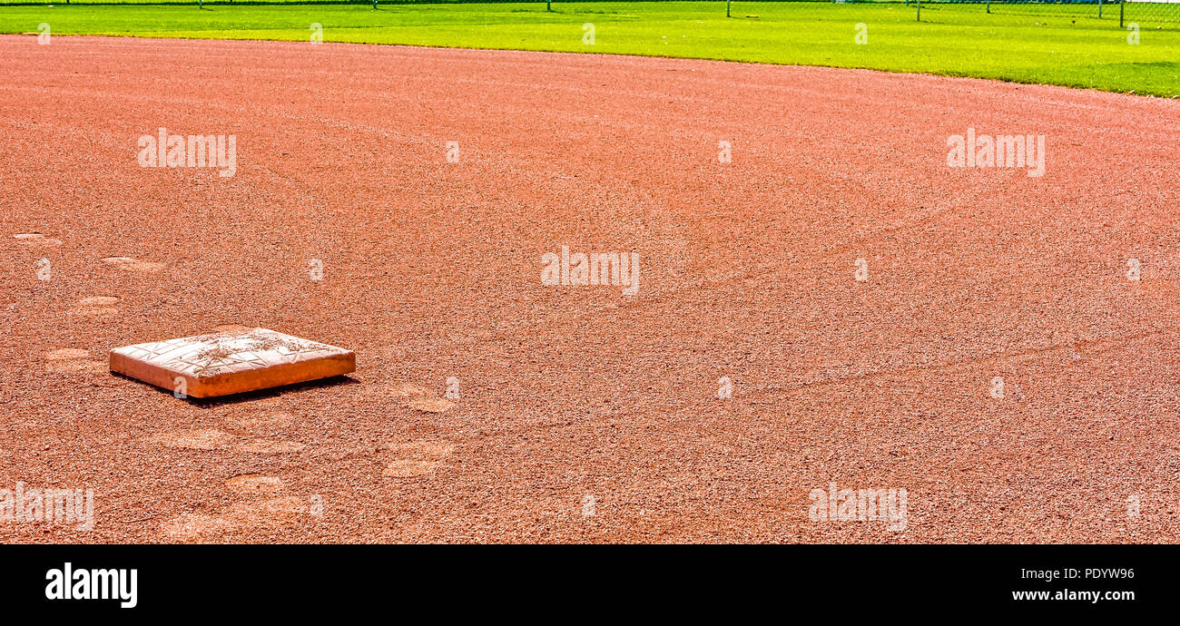 A baseball base in a newly planted and landscaped sports field Stock ...