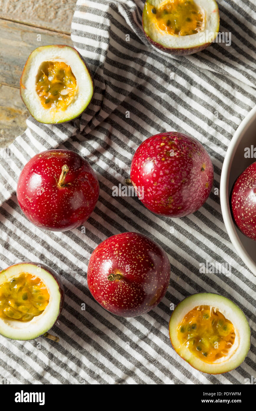 Red Organic Raw Passion Fruit Ready to Eat Stock Photo - Alamy
