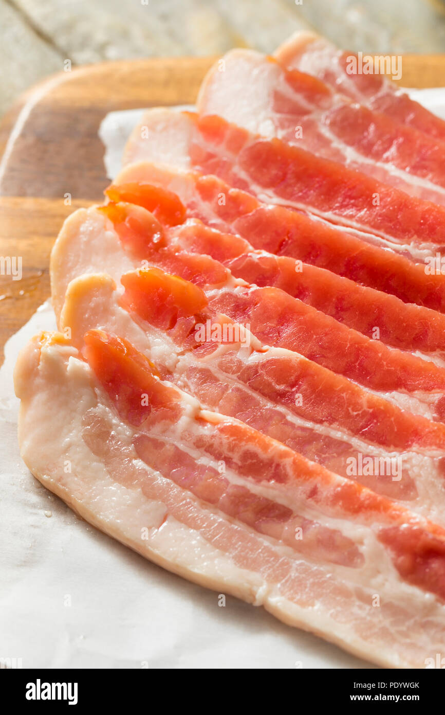 Raw Grass fed Bacon Strips Ready to Cook Stock Photo - Alamy