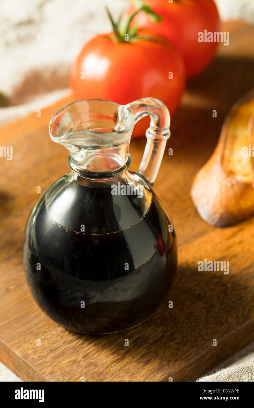 Organic Black Balsamic Vinegar in a Bottle Stock Photo - Alamy