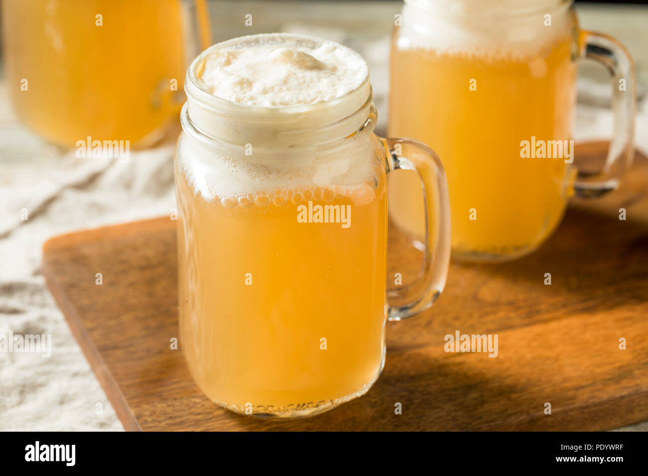 Sweet Homemade Butterscotch Butter Beer in a Mug Stock Photo - Alamy