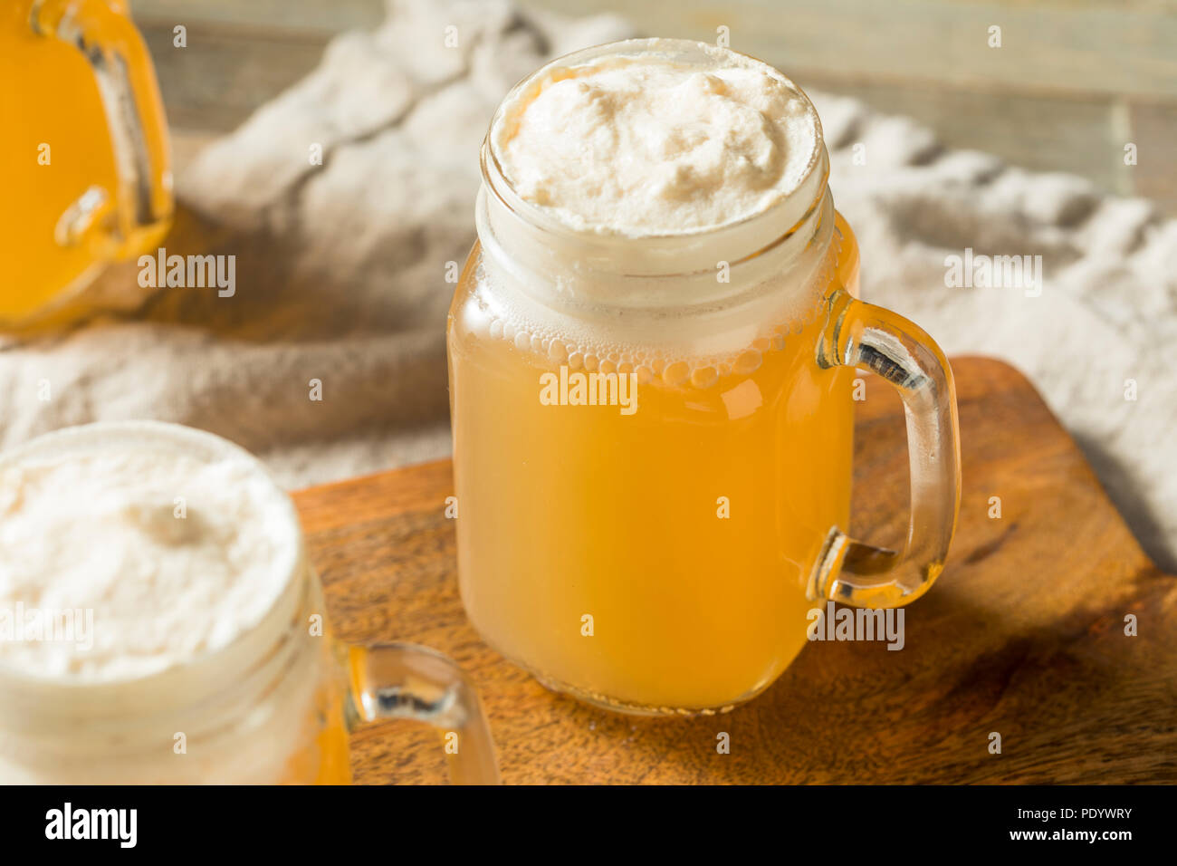 Sweet Homemade Butterscotch Butter Beer in a Mug Stock Photo - Alamy