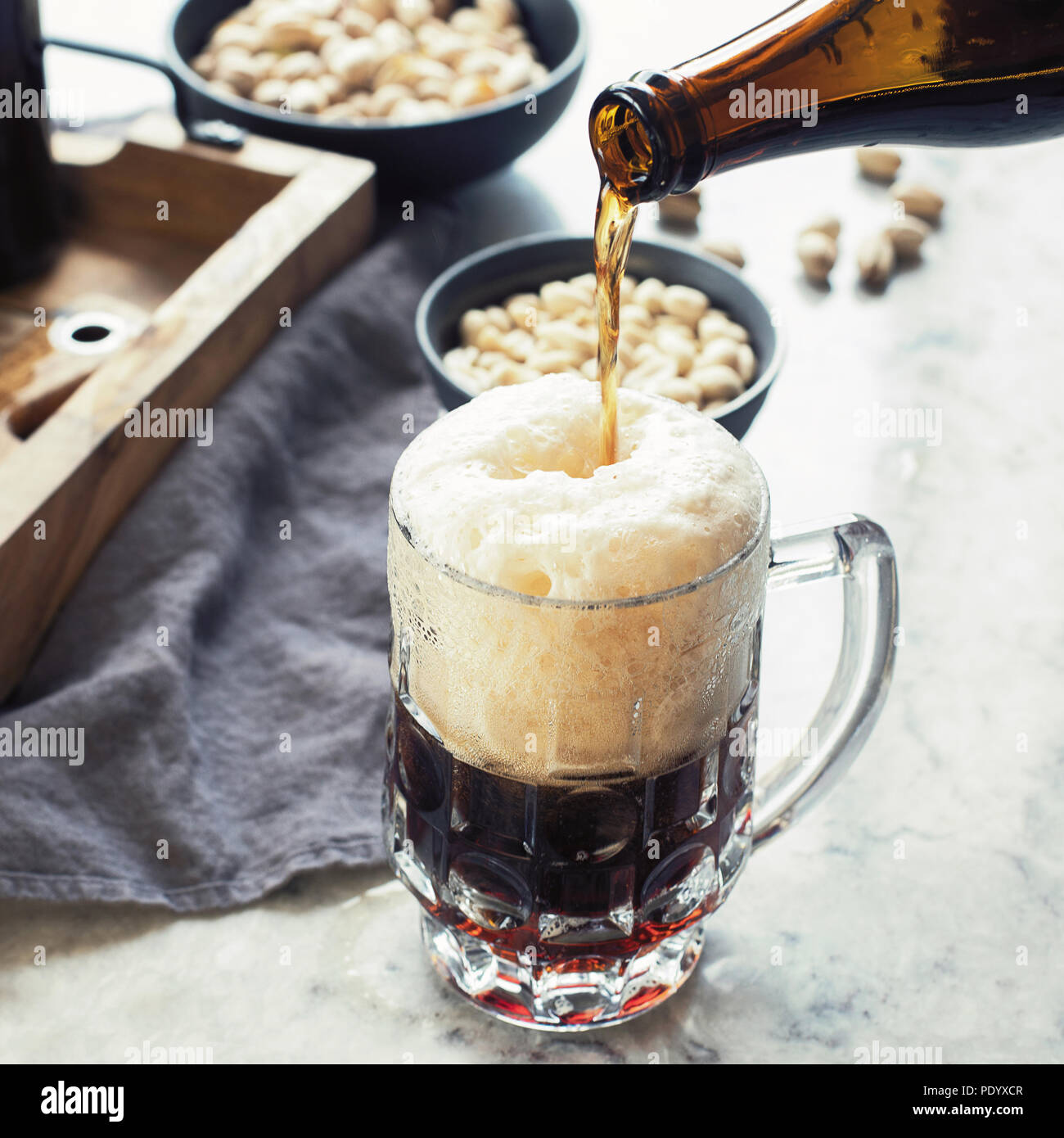 Pouring cold light beer from hi-res stock photography and images - Alamy
