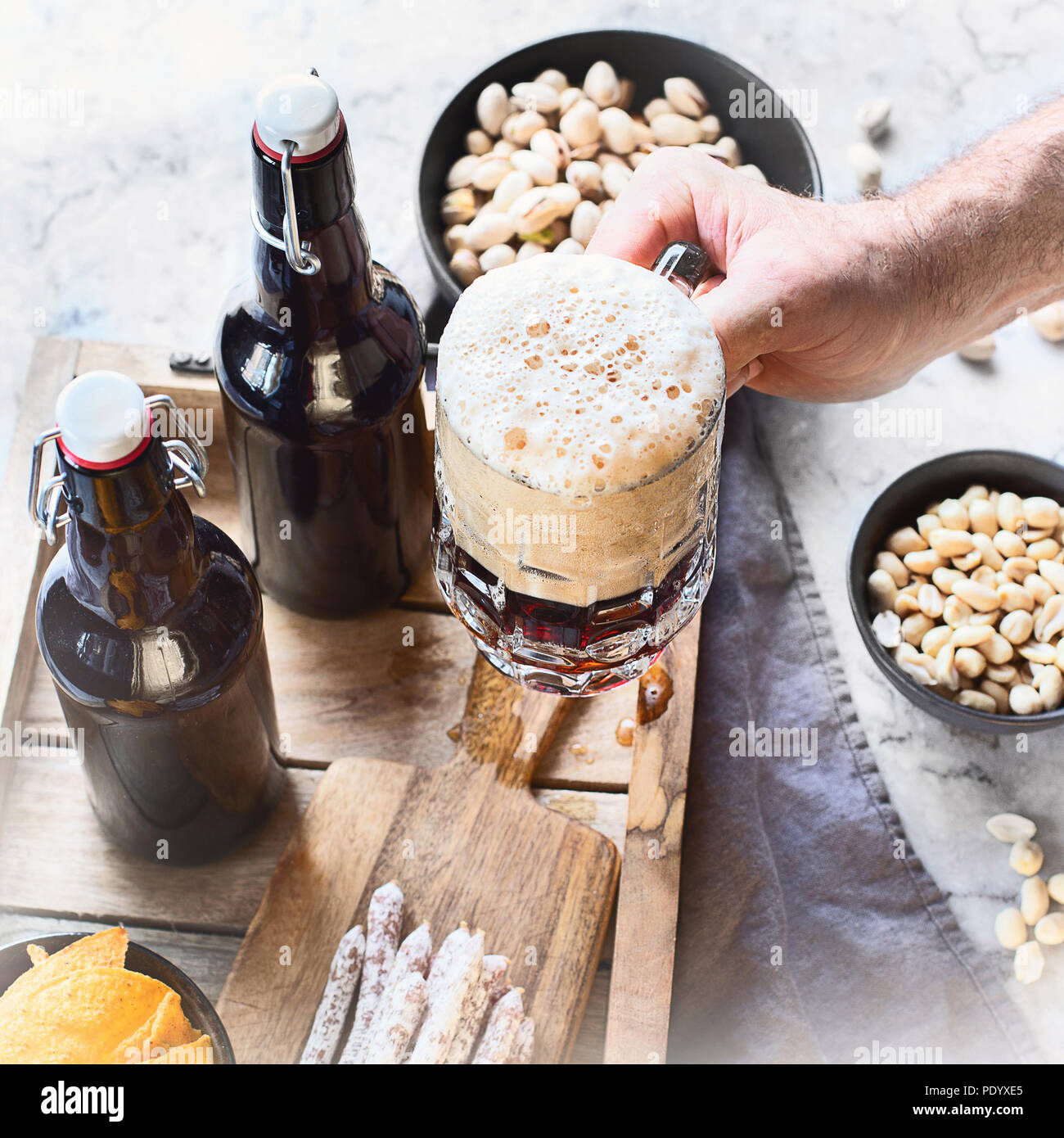 Man pouring pint hi-res stock photography and images - Alamy