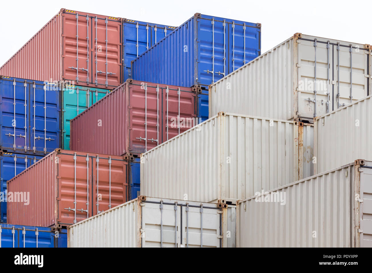 Cargo Containers Stack at the Pier docks Stock Photo - Alamy