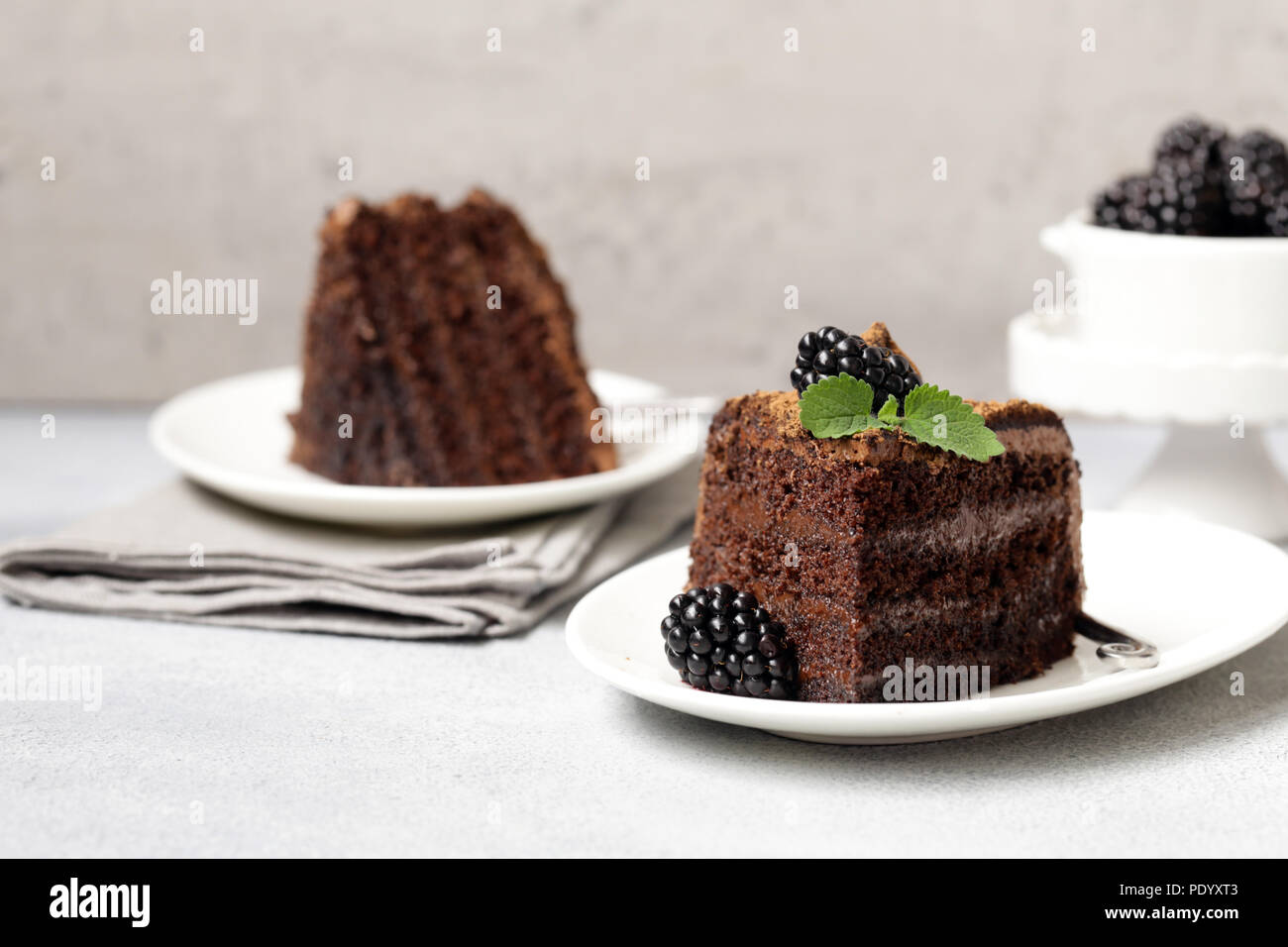 super chocolate truffle cake with black raspberries Stock Photo - Alamy