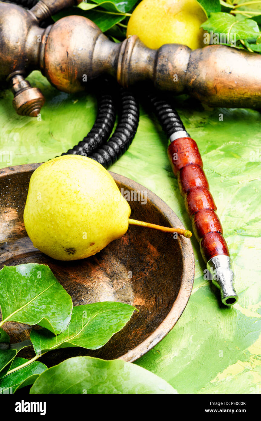 Hookah for smoking with the aroma pear.Pear shisha Stock Photo - Alamy