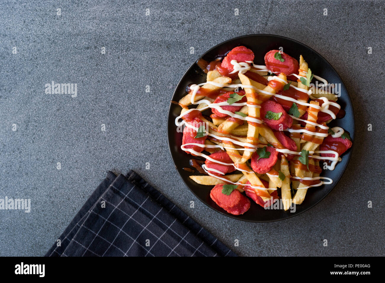 Homemade Peruvian Salchipapa Fries with Sausage Slices, Ketchup and ...