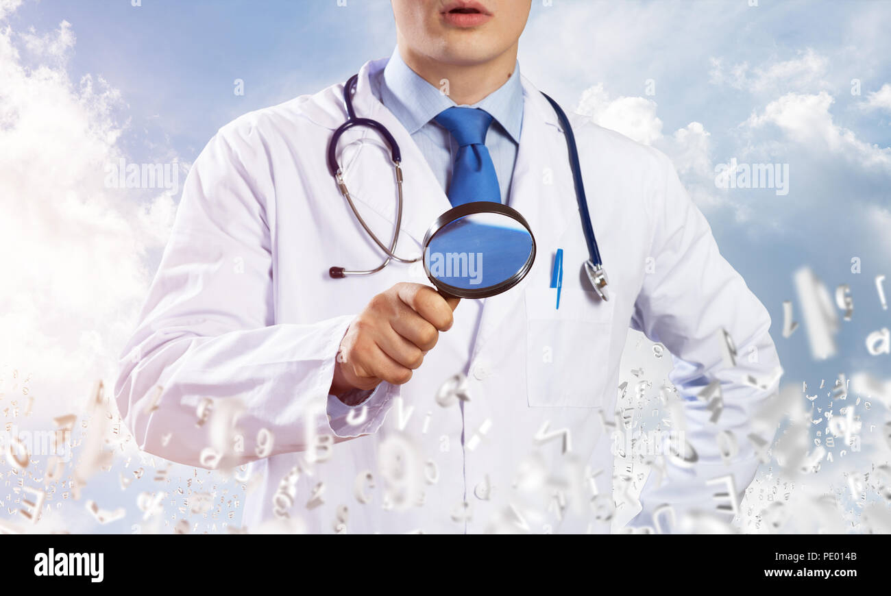 Doctor searching your diseases Stock Photo - Alamy