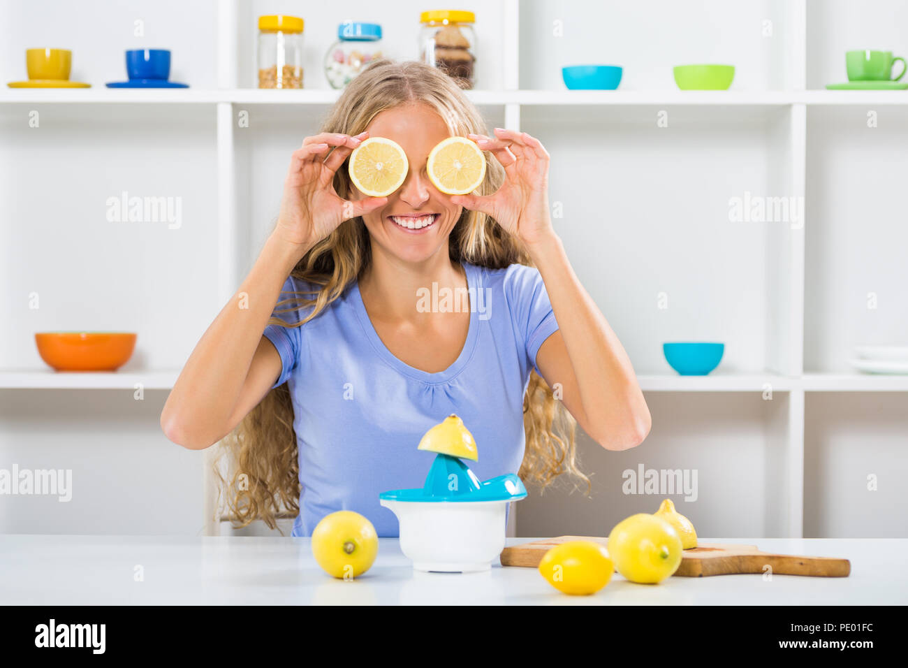 Woman making lemonade hi-res stock photography and images - Alamy