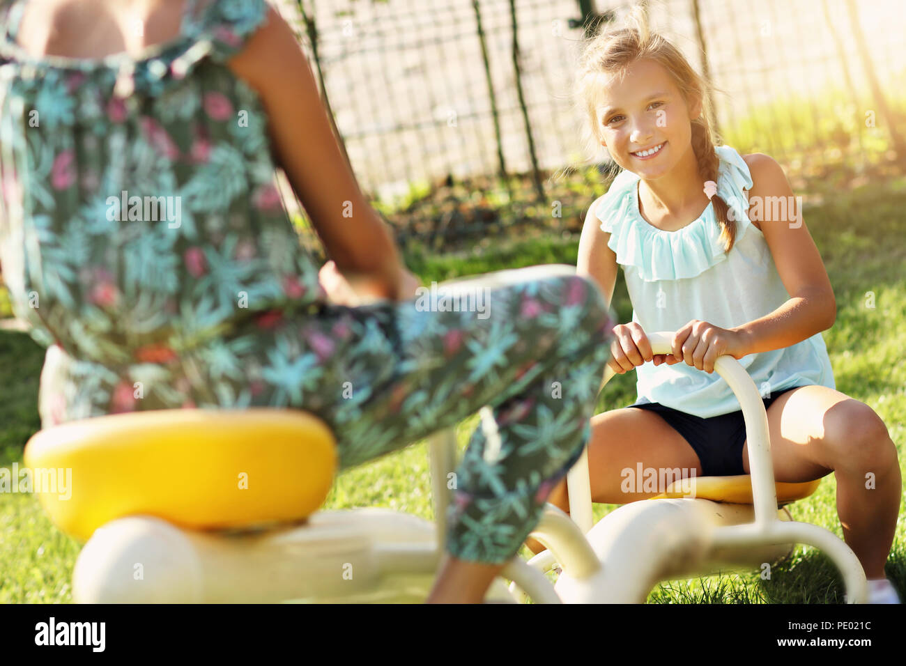 Joyful children having fun on playground Stock Photo - Alamy