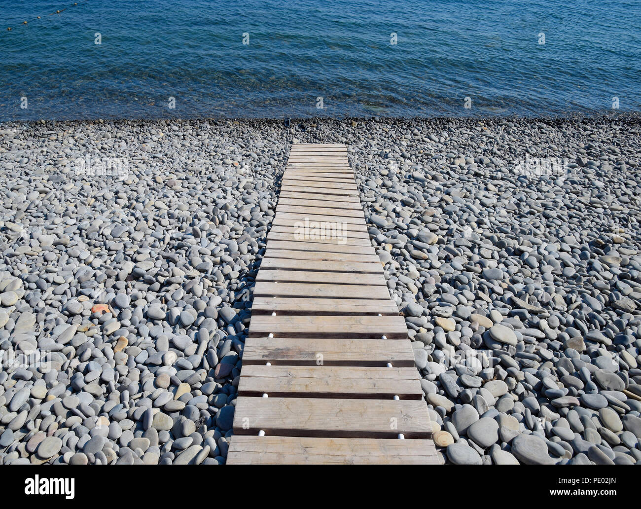 Wooden path to the sea. Flooring of planks on the path to the sea Stock ...