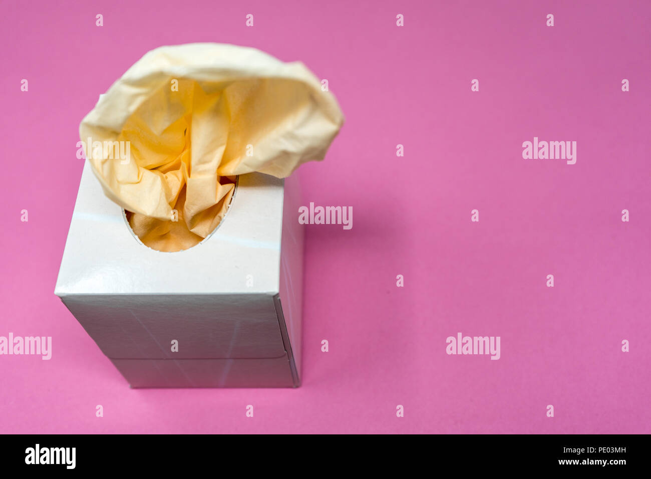 Facial Tissue Cube Box. Peach colored tissue paper Stock Photo - Alamy