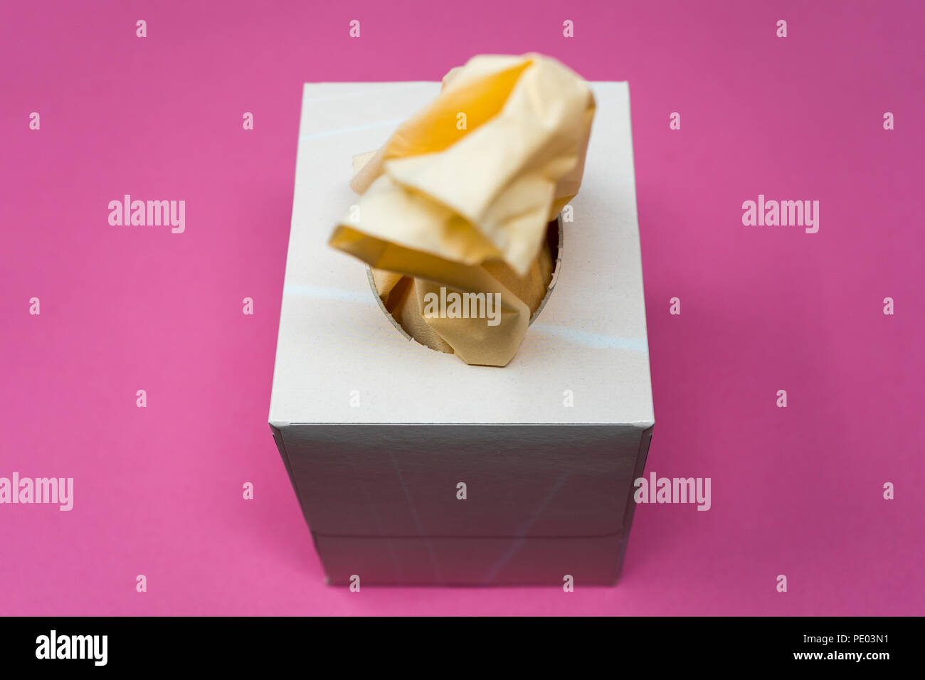 Facial Tissue Cube Box. Peach colored tissue paper Stock Photo - Alamy