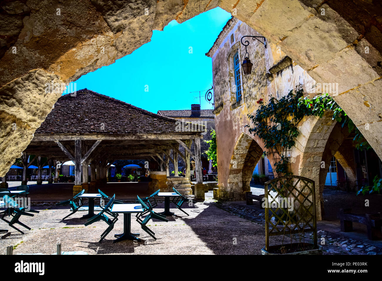 Central square in the medieval bastide village of Monpazier in the ...