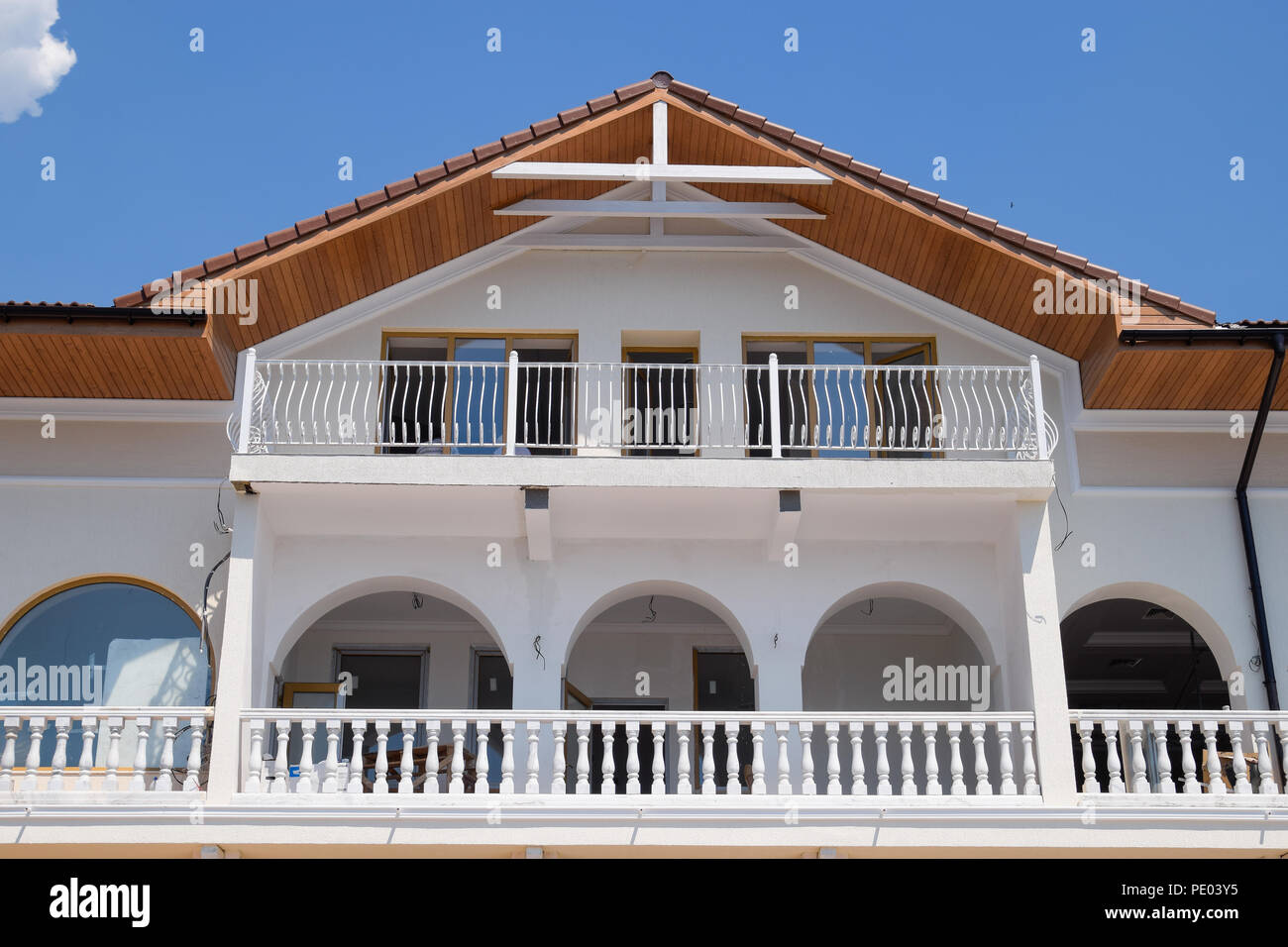 New house under construction. three storey building. Balcony in the ...