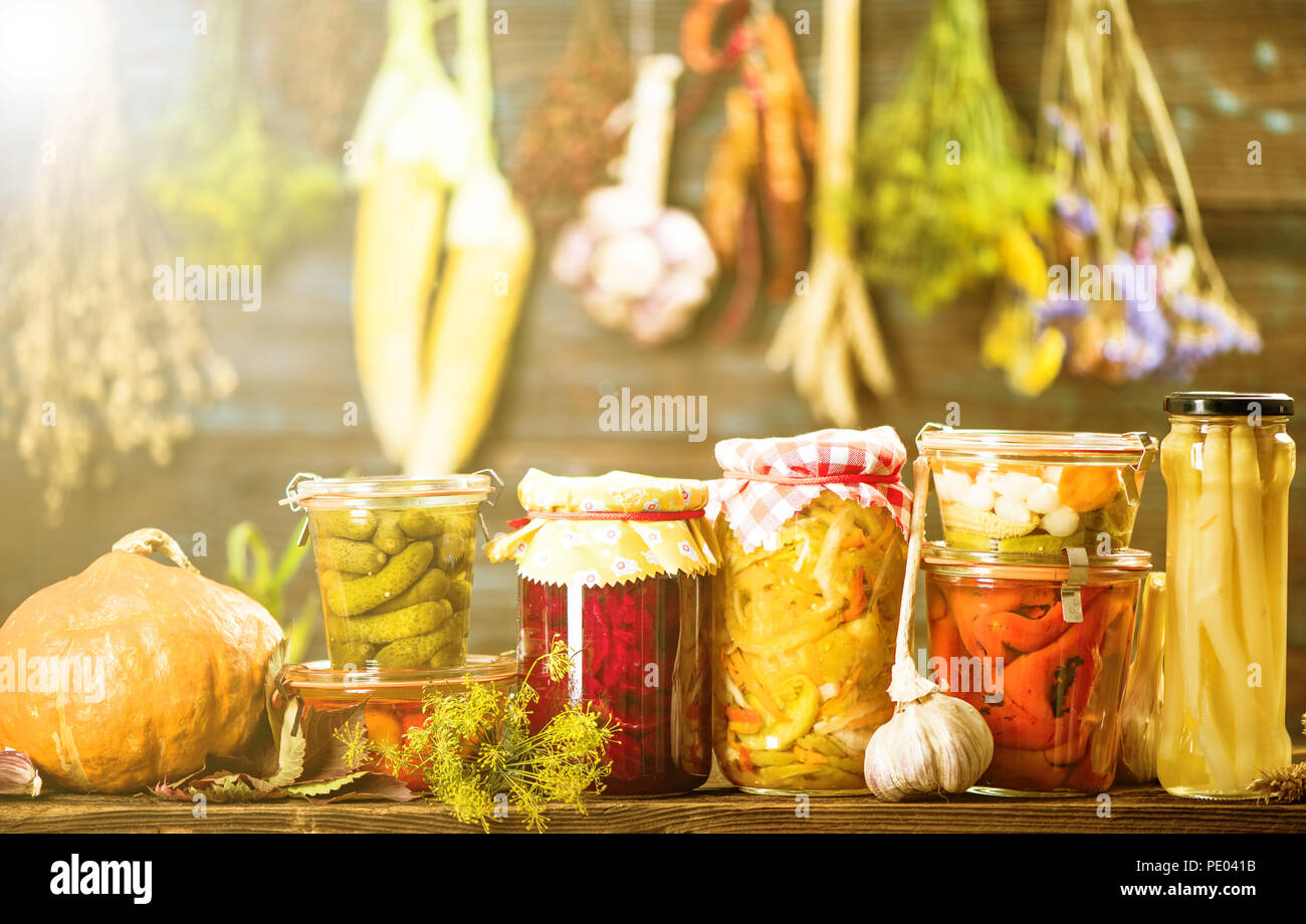 Pickled Marinated Fermented vegetables on shelves in cellar Stock Photo ...