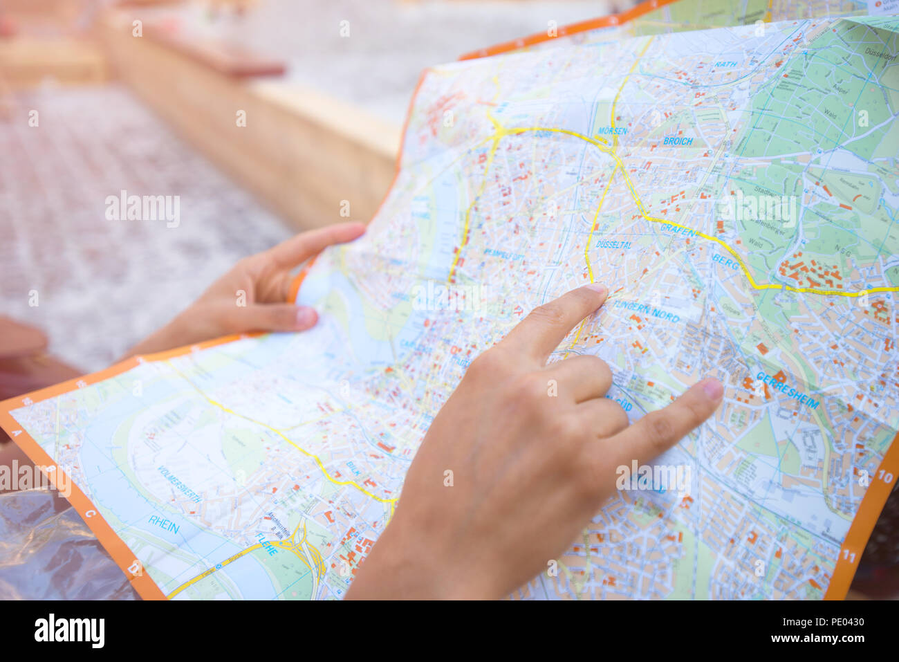 Pointing finger map hi-res stock photography and images - Alamy