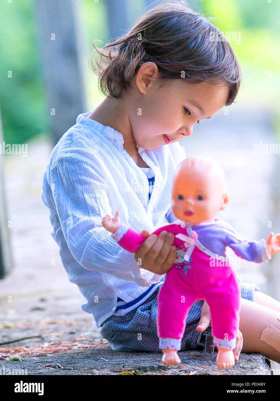 Doll girl image hi-res stock photography and images - Alamy