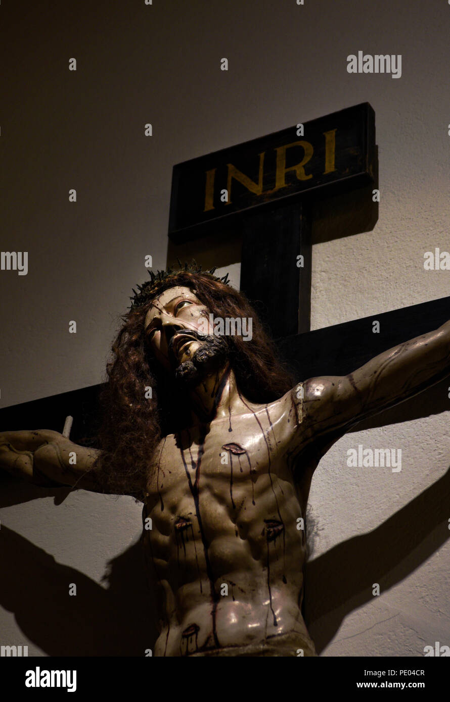 A wooden Crucifix mounted on a wall in the Cathedral Basilica of St ...