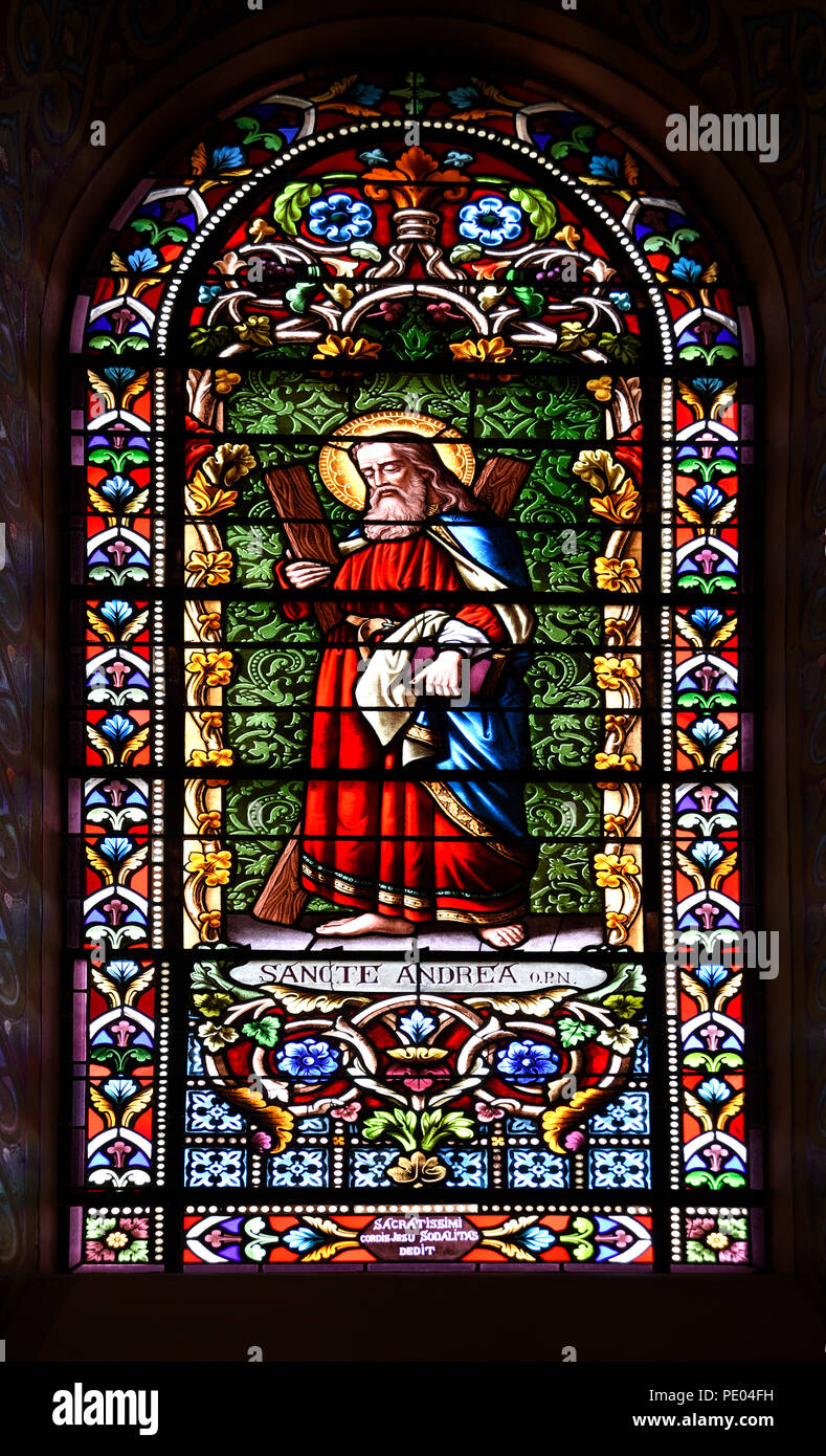 A stained glass window depicts Saint Andrew at the Cathedral Basilica ...