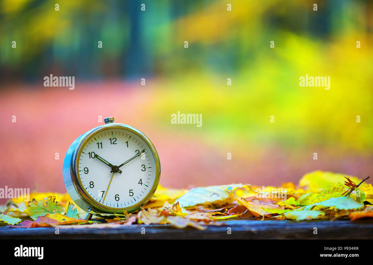 Time concept. Clock anounce autumn Stock Photo - Alamy