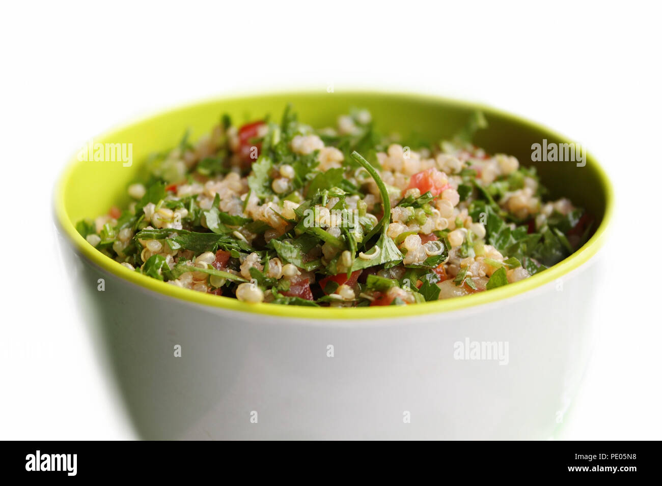 A bowl of Lebanese tabbouleh made with quinoa instead of traditional ...