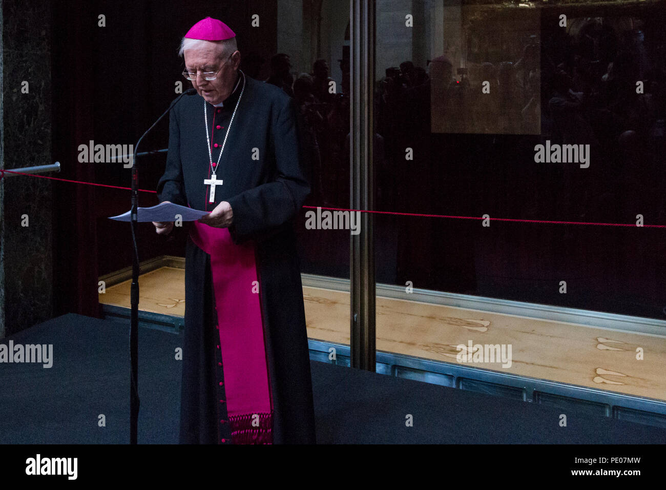Turin, Italy. 10th Aug, 2018. Archbishop of Turin Cesare Nosiglia shows ...