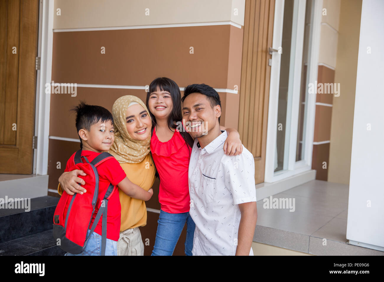 asian kid boy and girl hug their parents before going school Stock ...