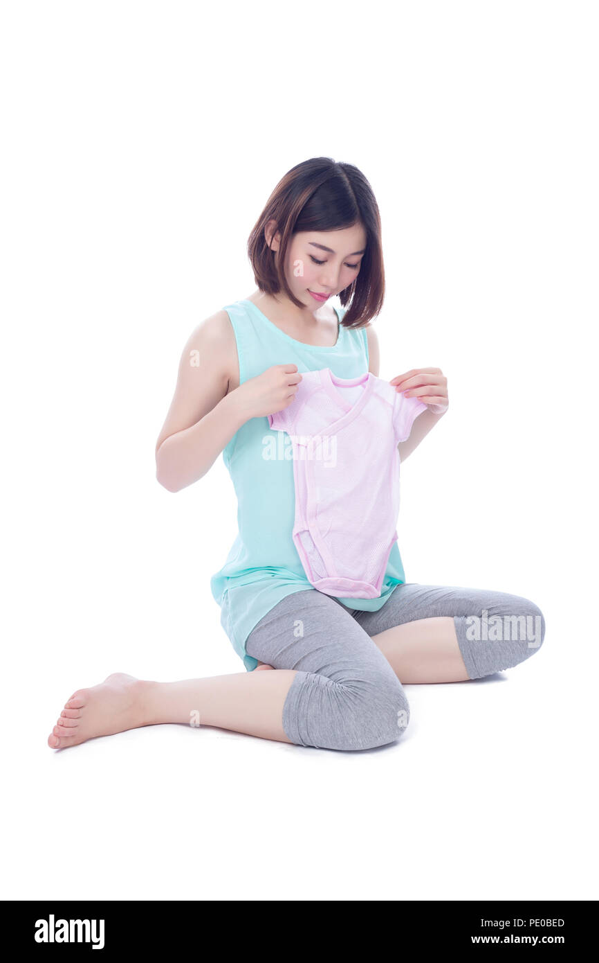Pregnant asian woman showing belly Cut Out Stock Images & Pictures - Alamy