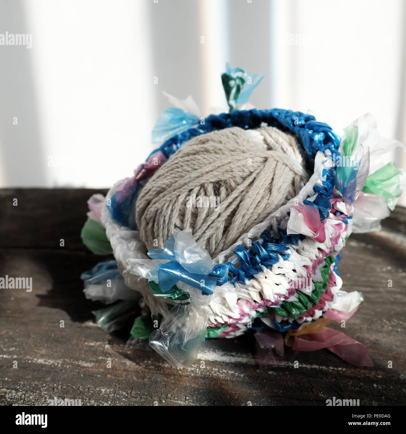 Cut nylon bag into yarn and knit to basket, good idea to recycle nylon ...