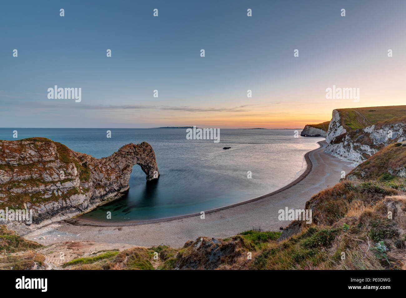 Durdle door at the Jurassic Coast in Dorset, England, at sunset Stock ...