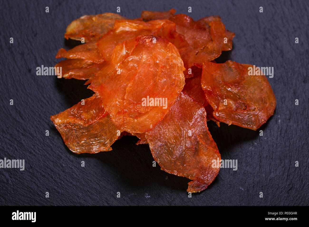 Dry chicken meat over wooden Stock Photo - Alamy
