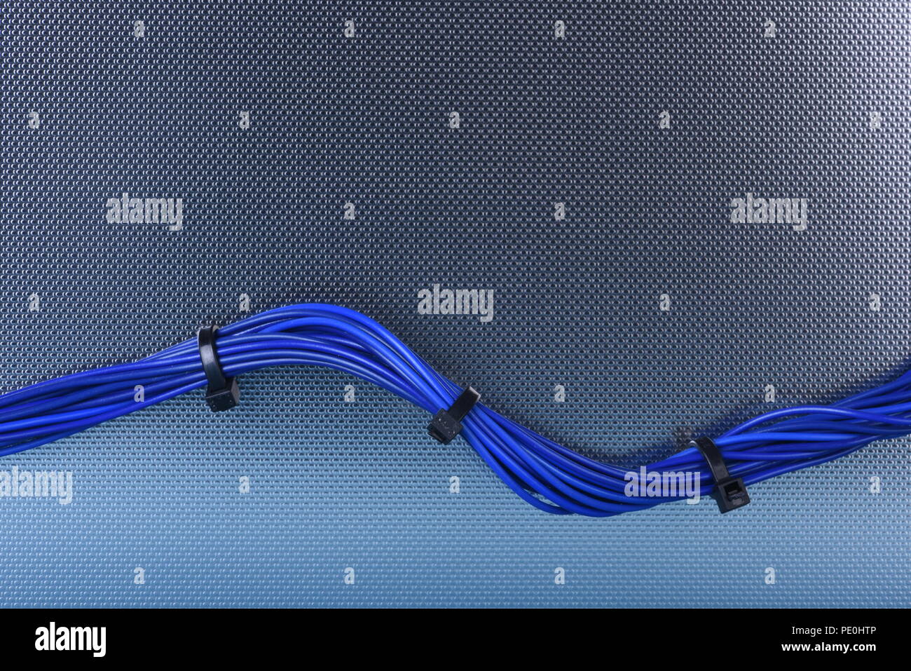 Bundle electric cable with cable ties Stock Photo - Alamy