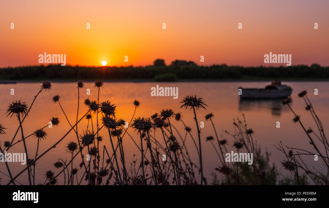 Amazing beautiful sunset on the river Stock Photo - Alamy