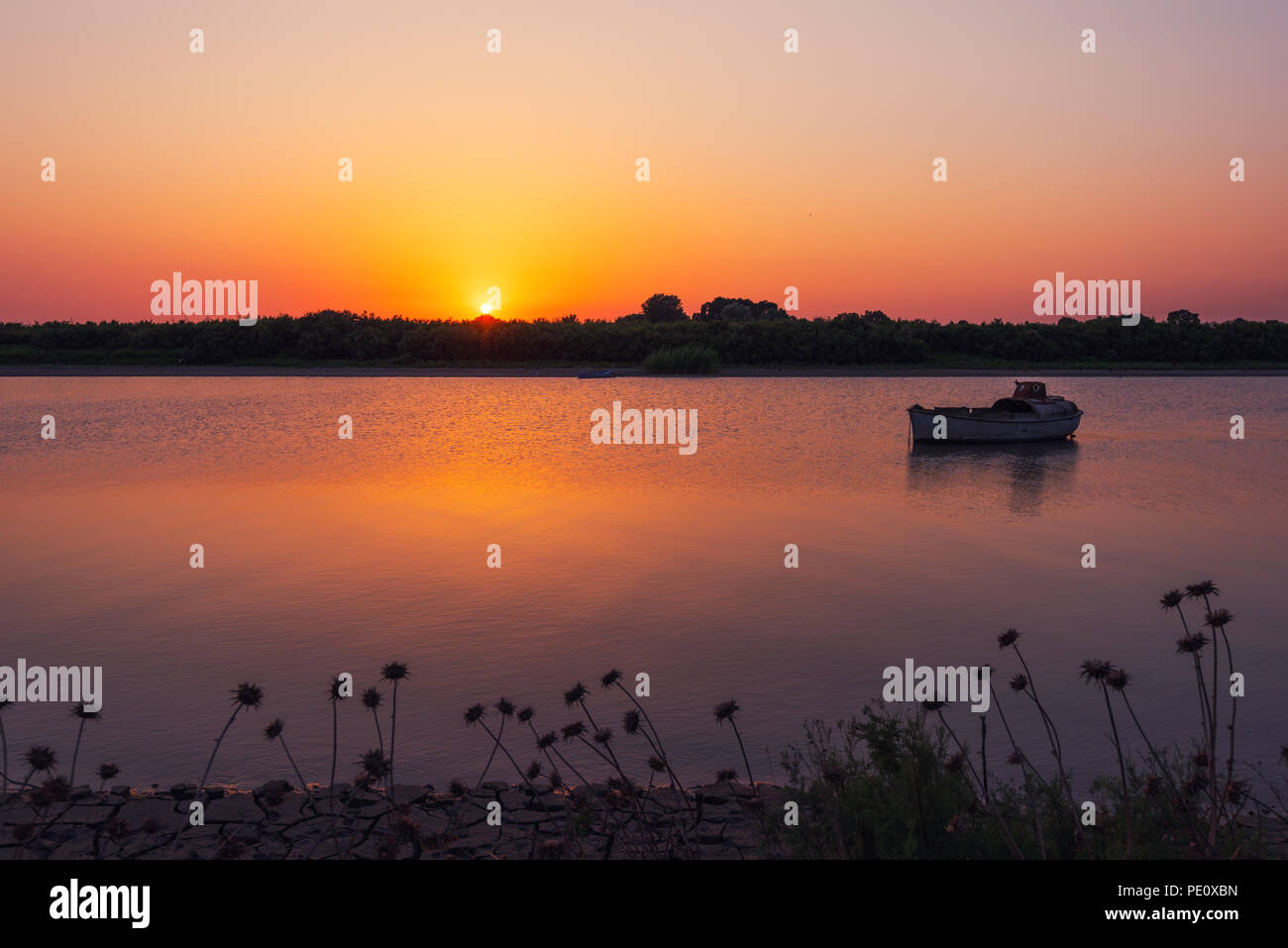 Amazing beautiful sunset on the river Stock Photo - Alamy