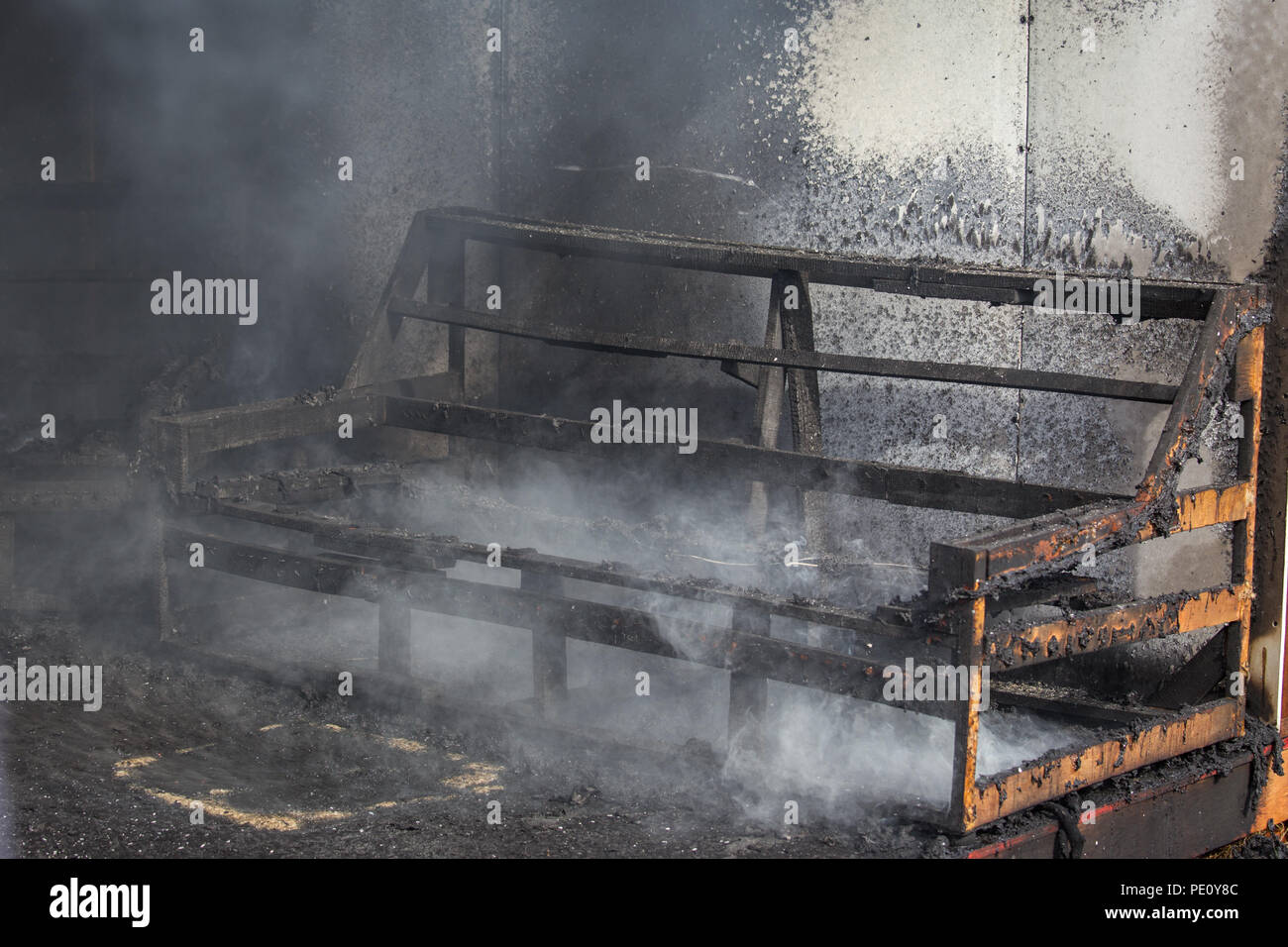 chair and furniture in house after burned with smoke and dust in burn ...