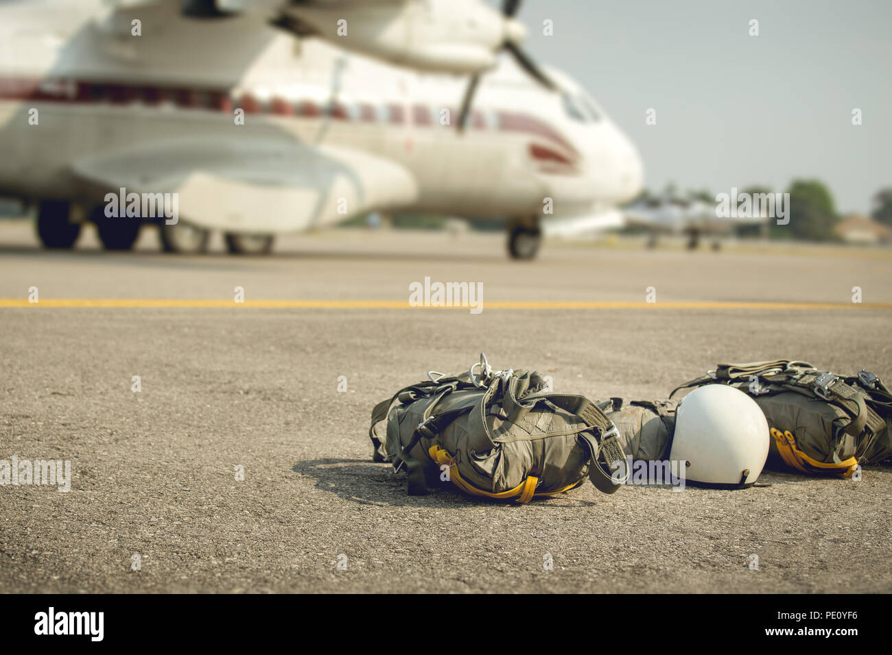 T-10 parachute with helmet and equipment for paratroop stanby on ground ...