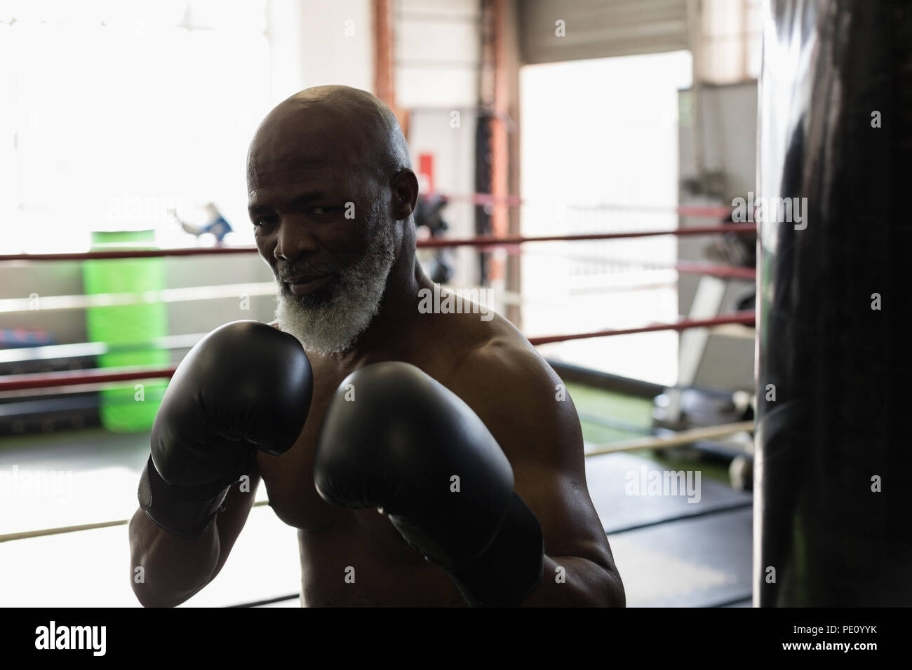 Senior man boxing in the boxing ring Stock Photo - Alamy